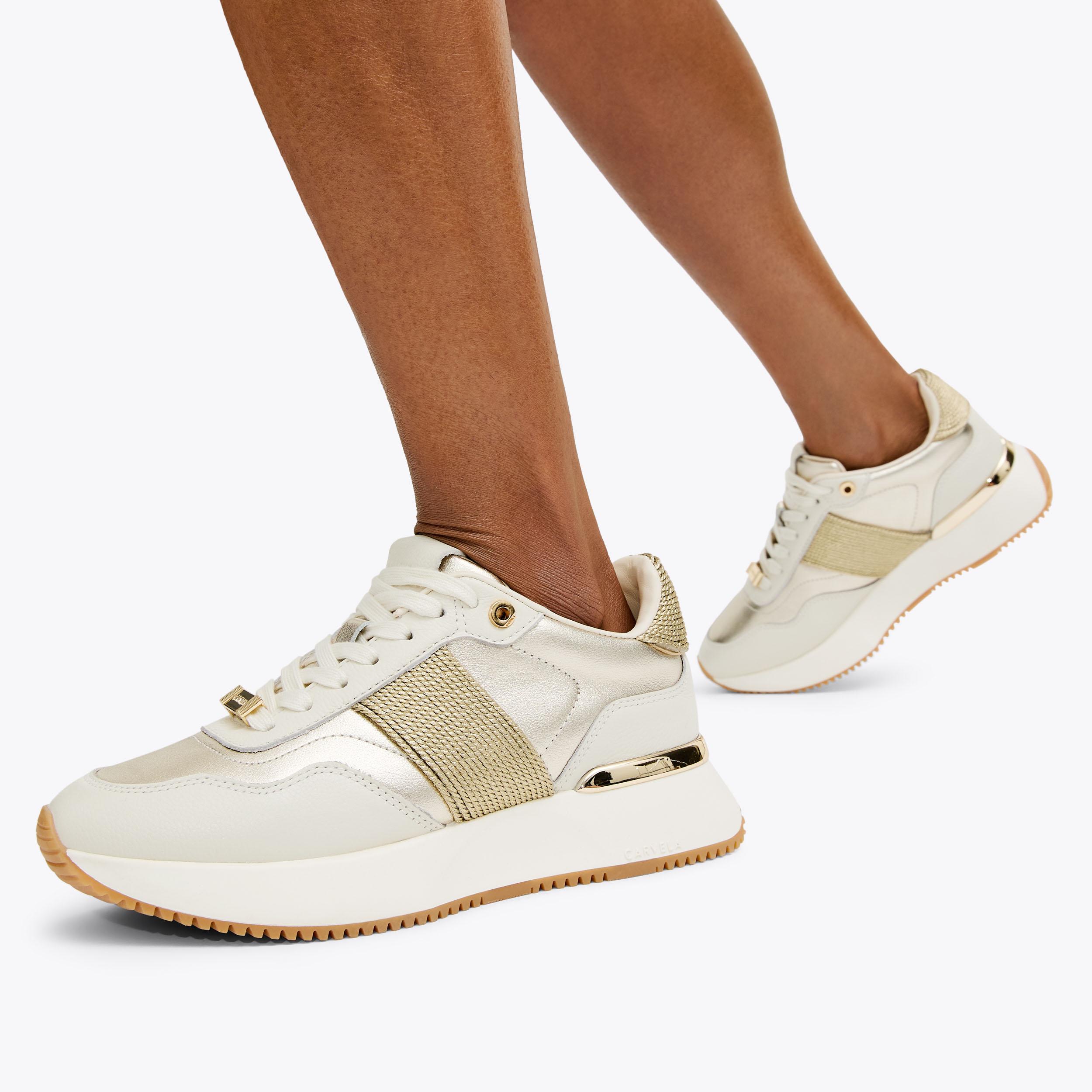 FLARE GALA Gold Leather Trainer by CARVELA
