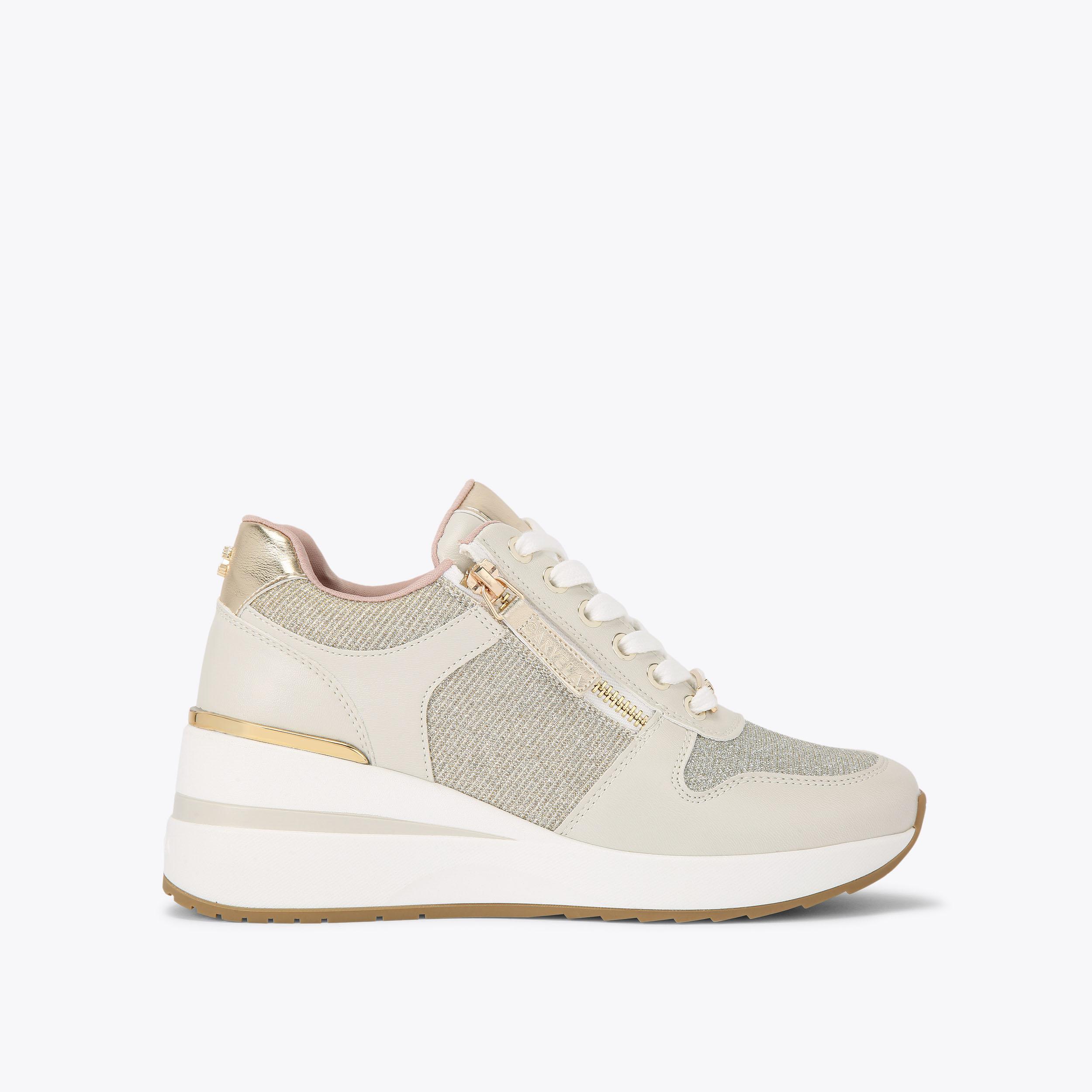 HIGH RISE Gold Fabric Trainer by CARVELA
