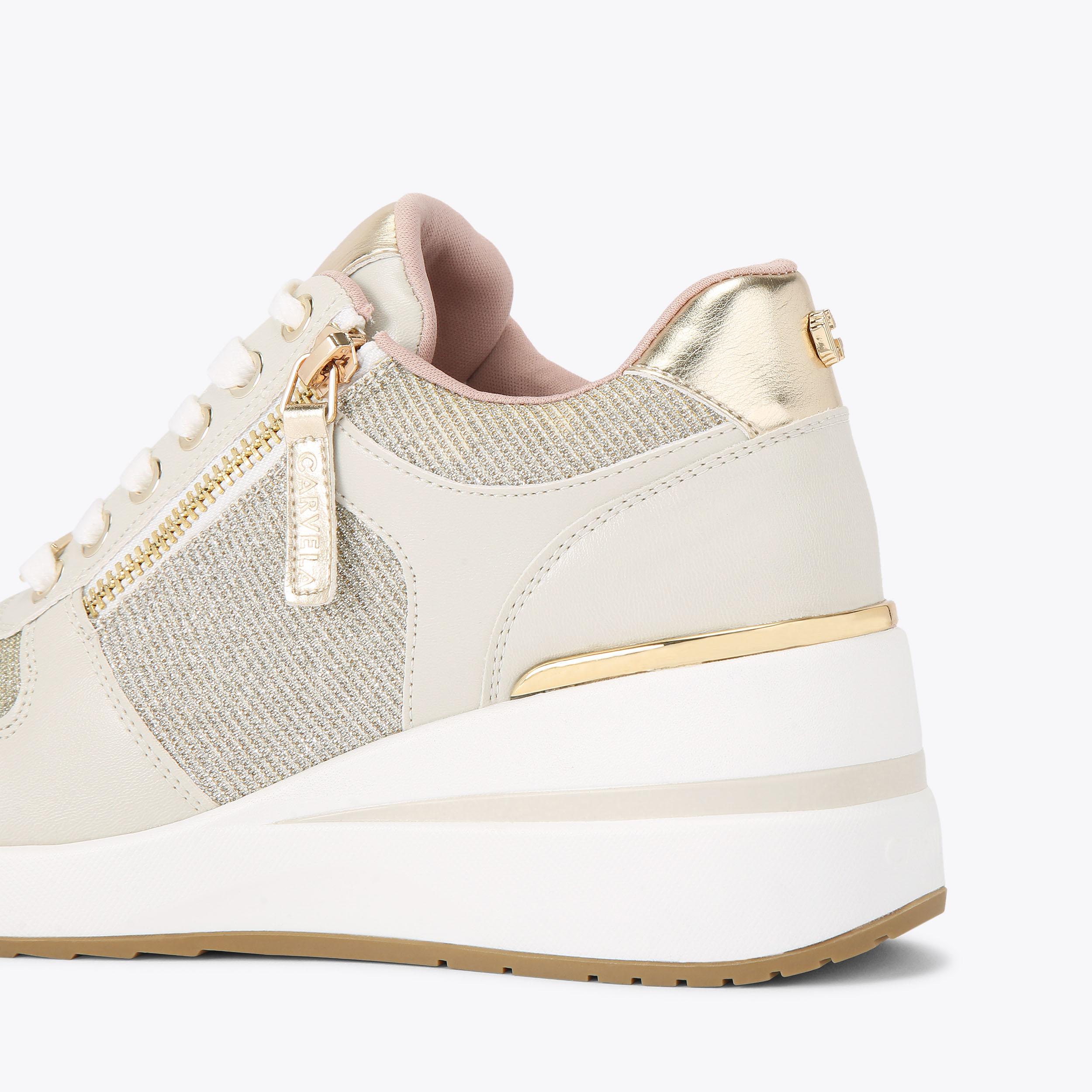 HIGH RISE Gold Fabric Trainer by CARVELA