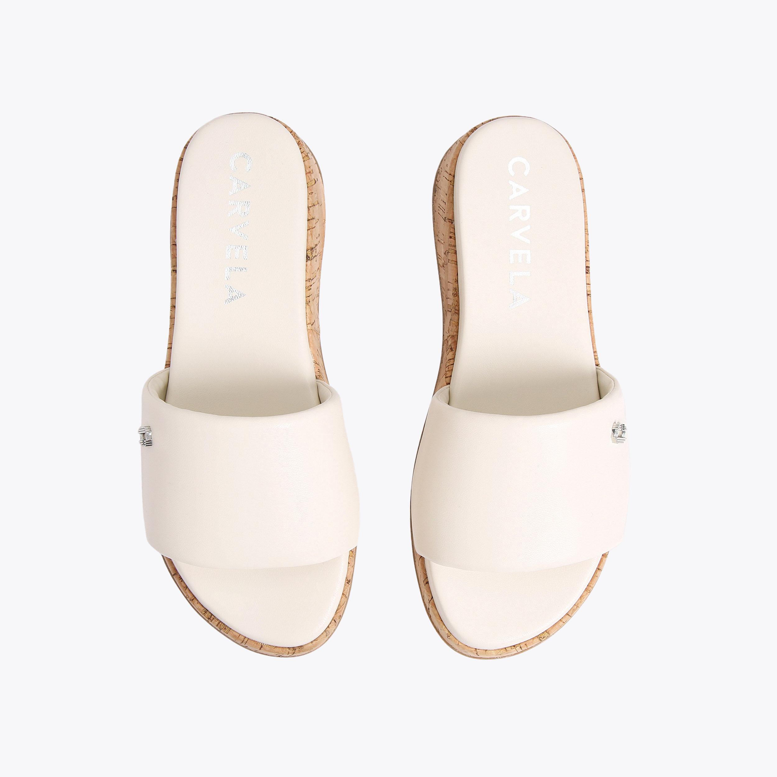 CLOUD MULE Bone Sandals by CARVELA